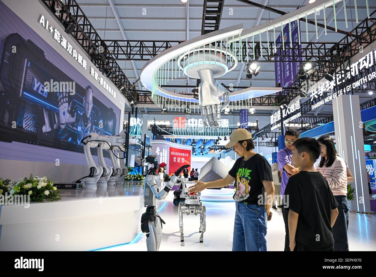 **CHINESE MAINLAND, HONG KONG, MACAU AND TAIWAN OUT**Visitors interact ...