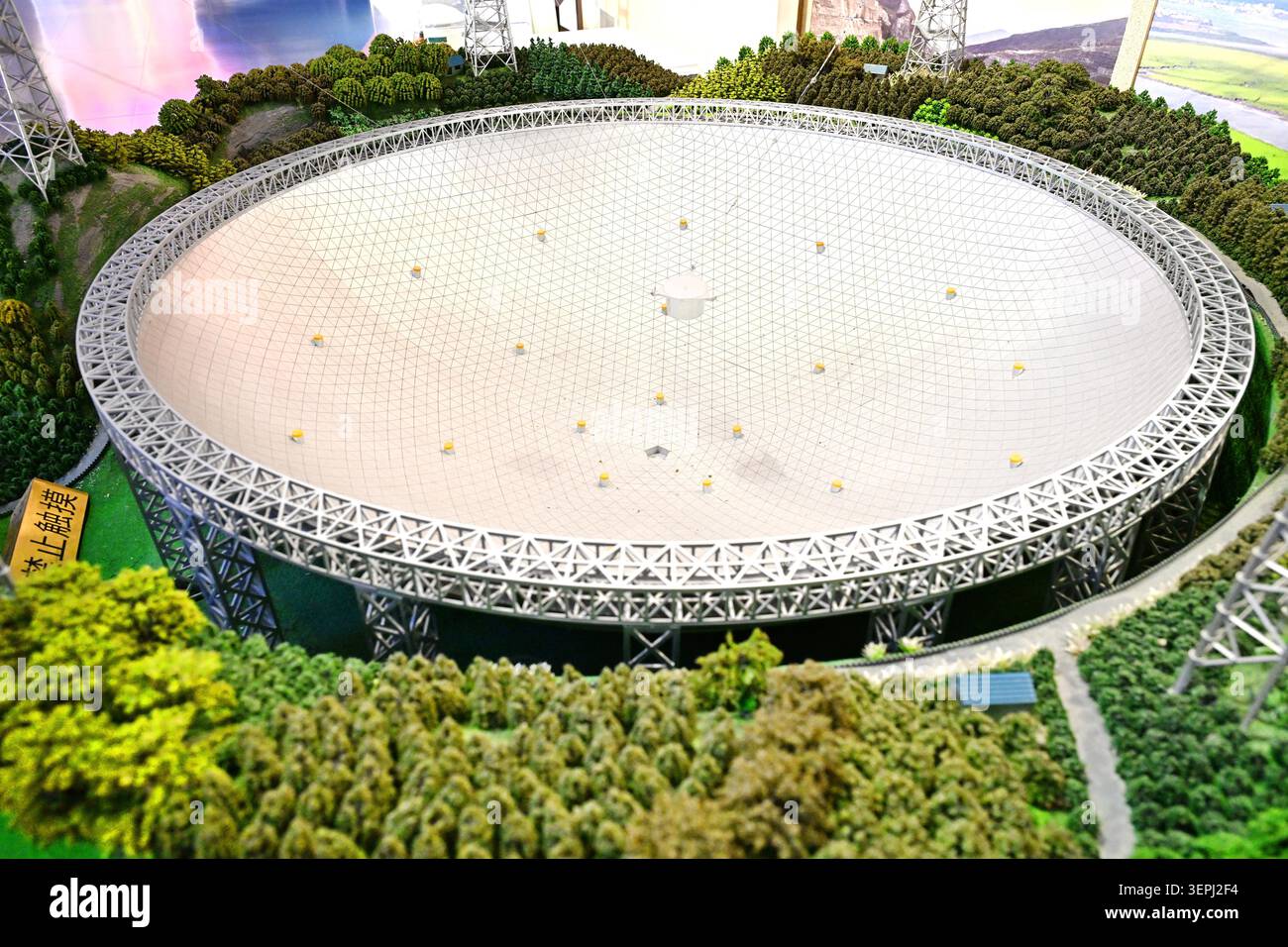 A 1:312 scale model of China's FAST telescope is displayed at the ...