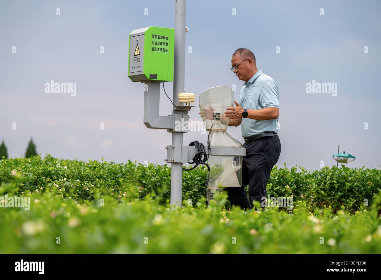 Agricultural technicians inspect smart monitoring equipment at China ...