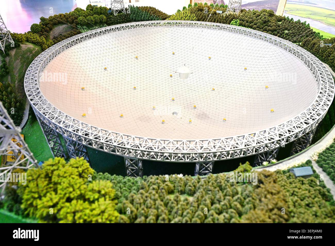 A 1:312 scale model of China's FAST telescope is displayed at the ...