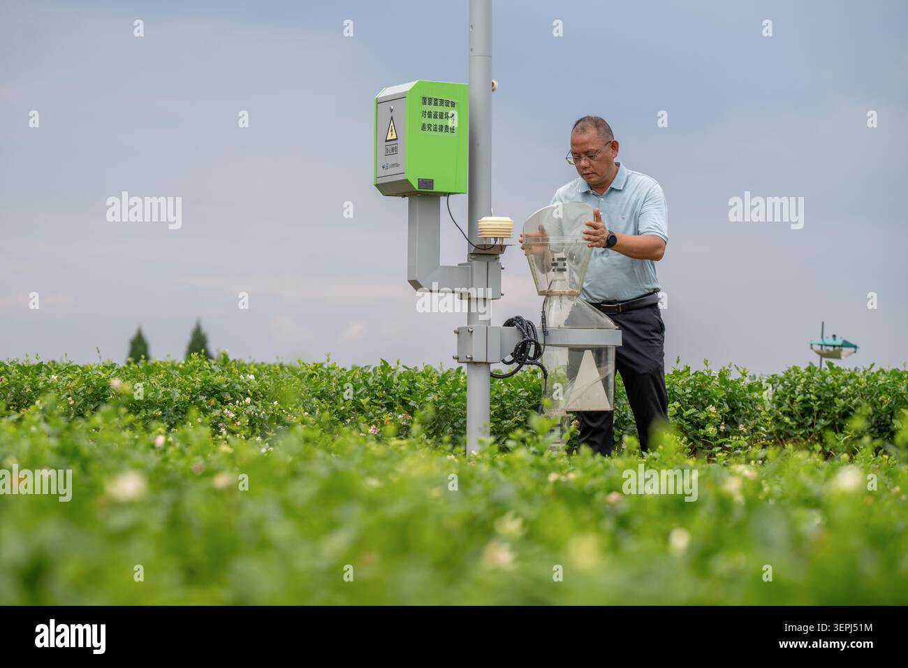 Agricultural technicians inspect smart monitoring equipment at China ...