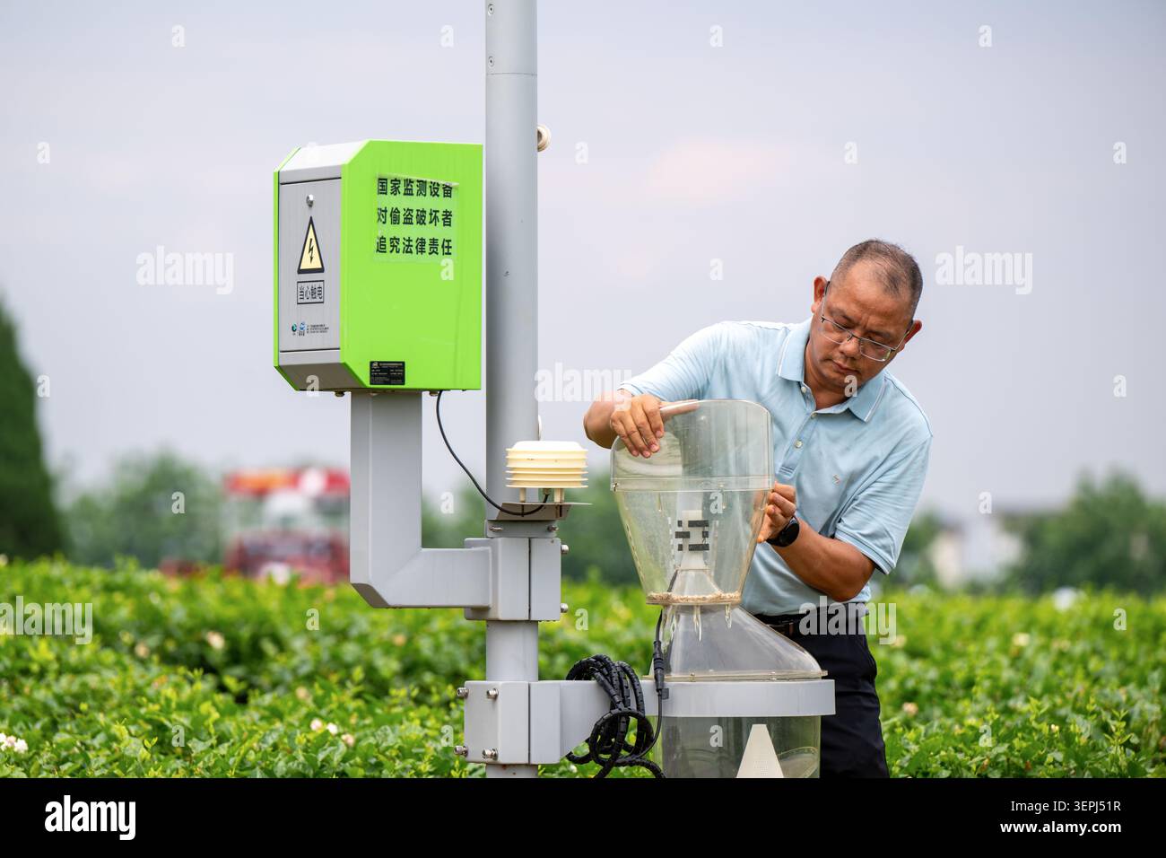 Agricultural technicians inspect smart monitoring equipment at China ...