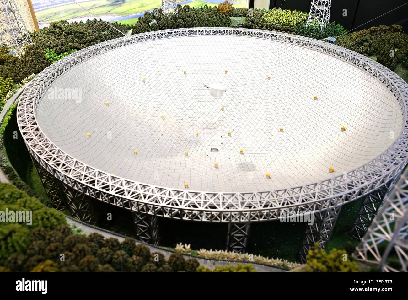 A 1:312 scale model of China's FAST telescope is displayed at the ...