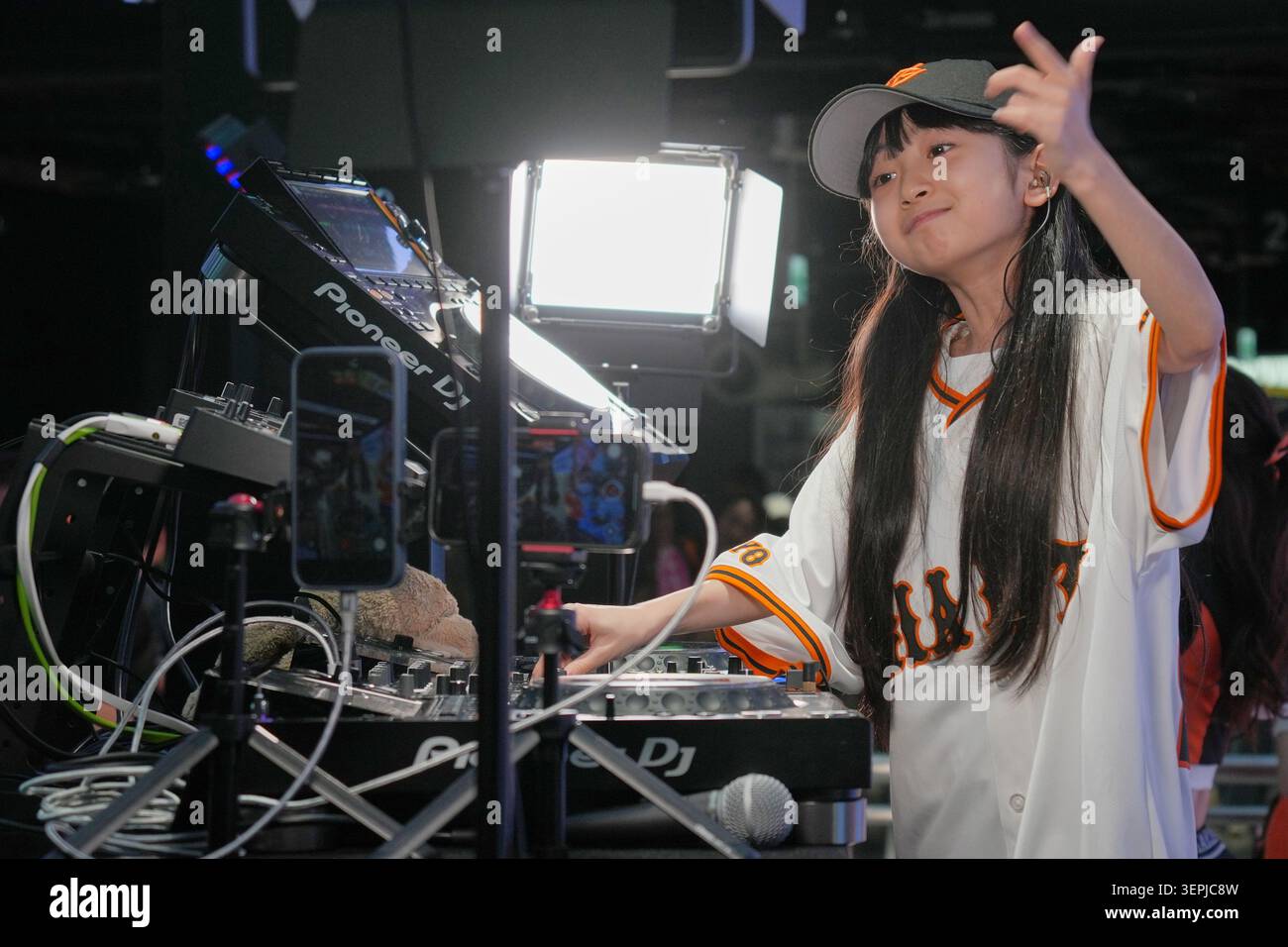 Nine-year-old DJ Rinoka performs at Tokyo Dome before a Yomiuri Giants ...