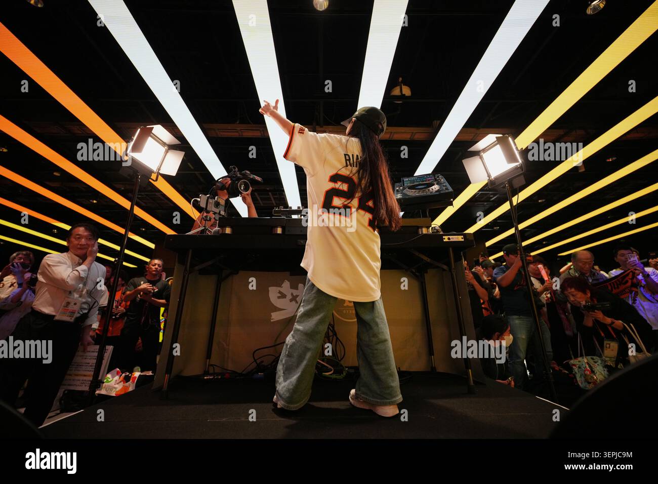 Nine-year-old DJ Rinoka performs at Tokyo Dome before a Yomiuri Giants ...