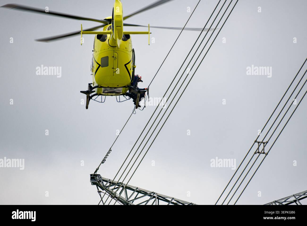15 June 2026, North Rhine-Westphalia, Meerbusch: A worker is attaching ...