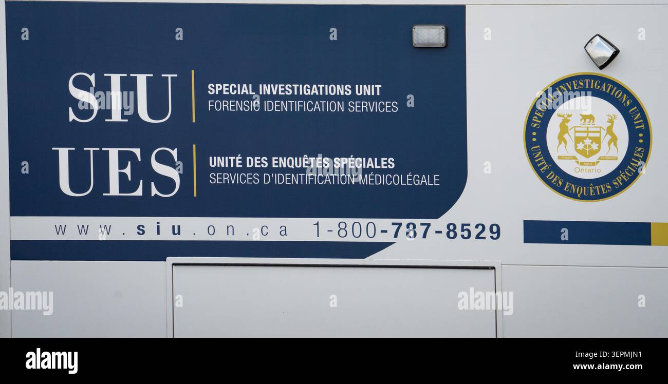 A Special Investigations Unit logo is seen on a truck in Mississauga ...