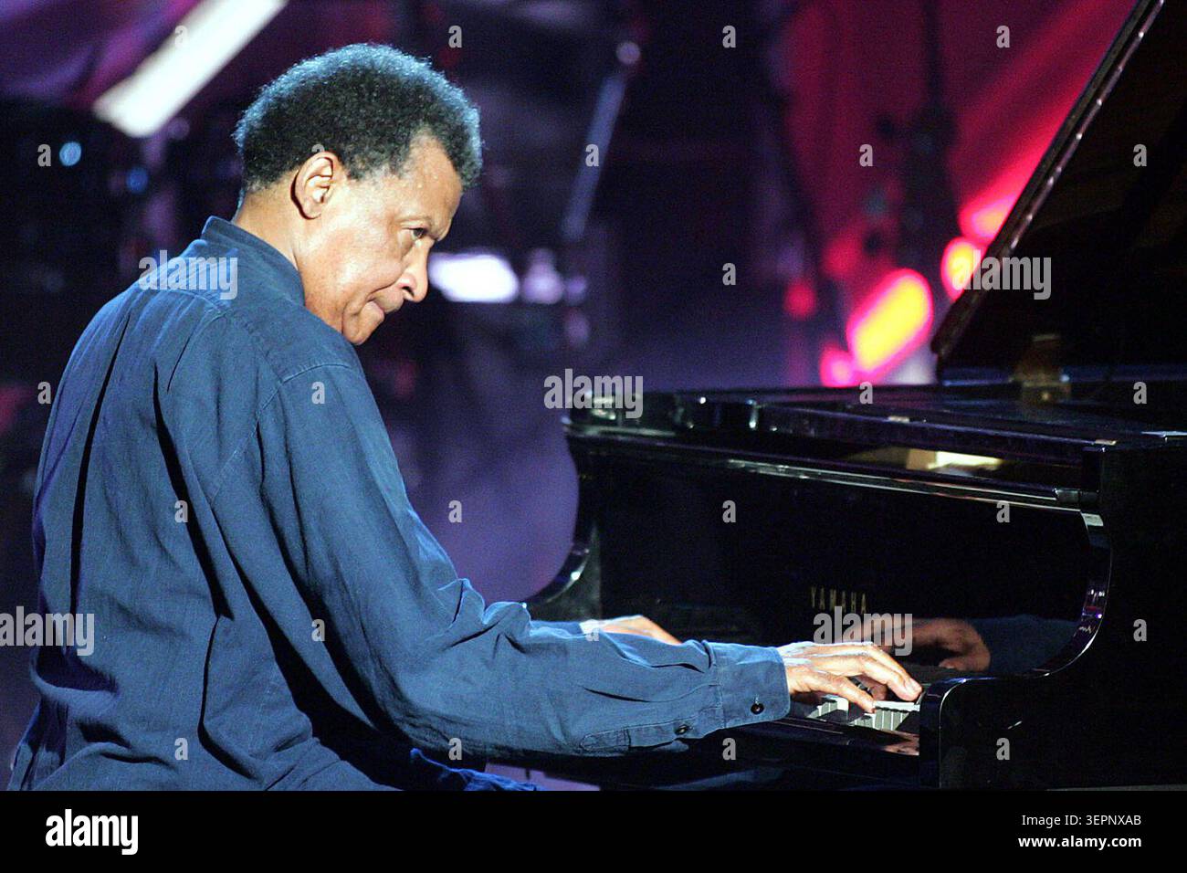 FILE - Musician Abdullah Ibrahim plays on a grand piano during the ...