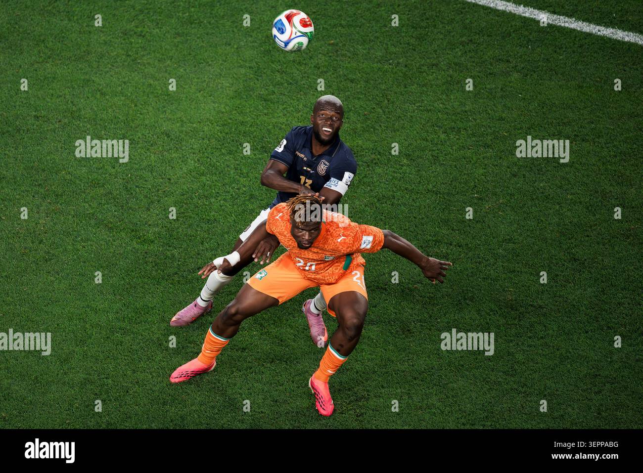 Emmanuel Agbadou of Cote d'Ivoire competes for the ball with Enner ...