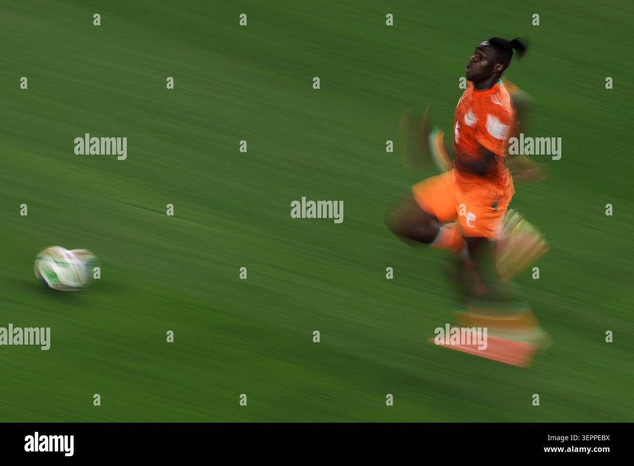 Wilfried Singo of Cote d'Ivoire runs with the ball during the FIFA ...
