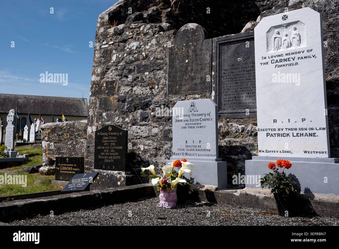 A Carney family headstone is seen in the St Patrick Church cemetary in ...