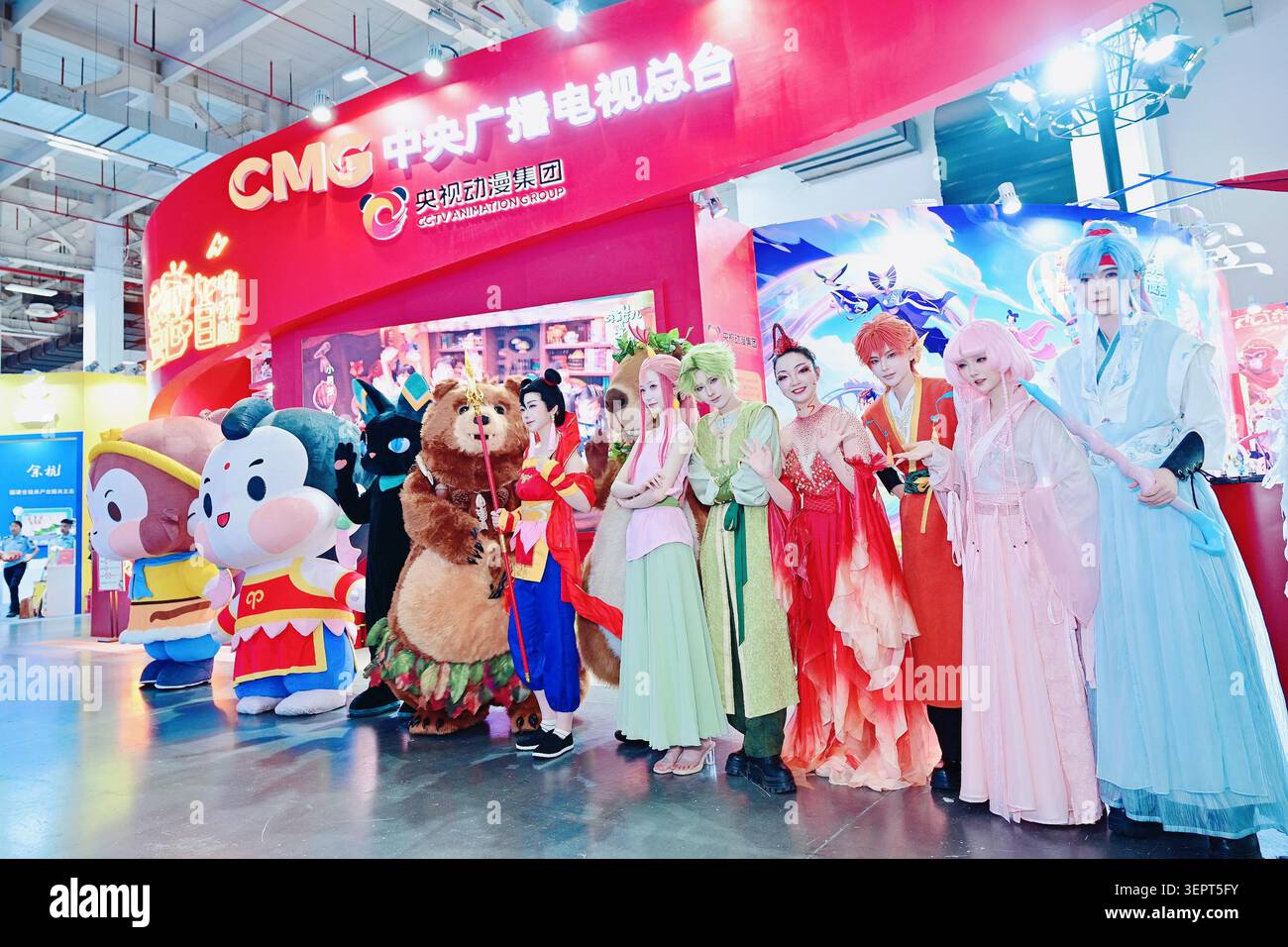 Cosplayers perform at CCTV Animation booth during the 22nd China ...