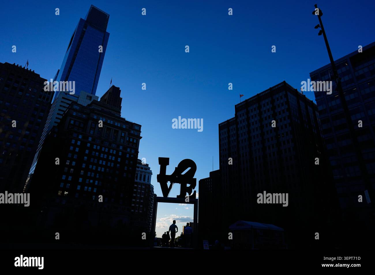 People walk past the Love Sculpture in Philadelphia, Monday, June 15 ...
