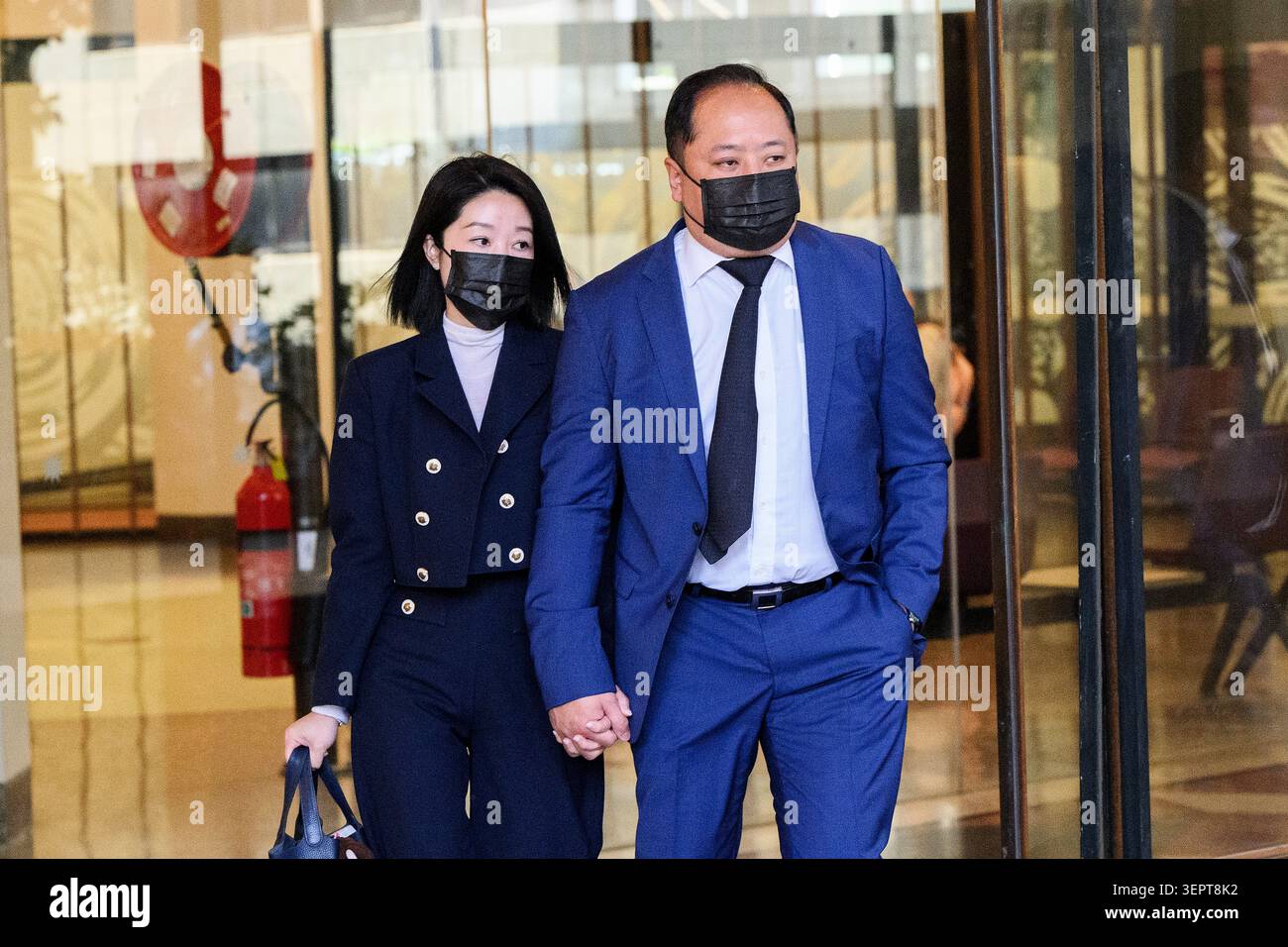 Jonathan Yee (right) is seen during a break at the Downing Centre Court ...