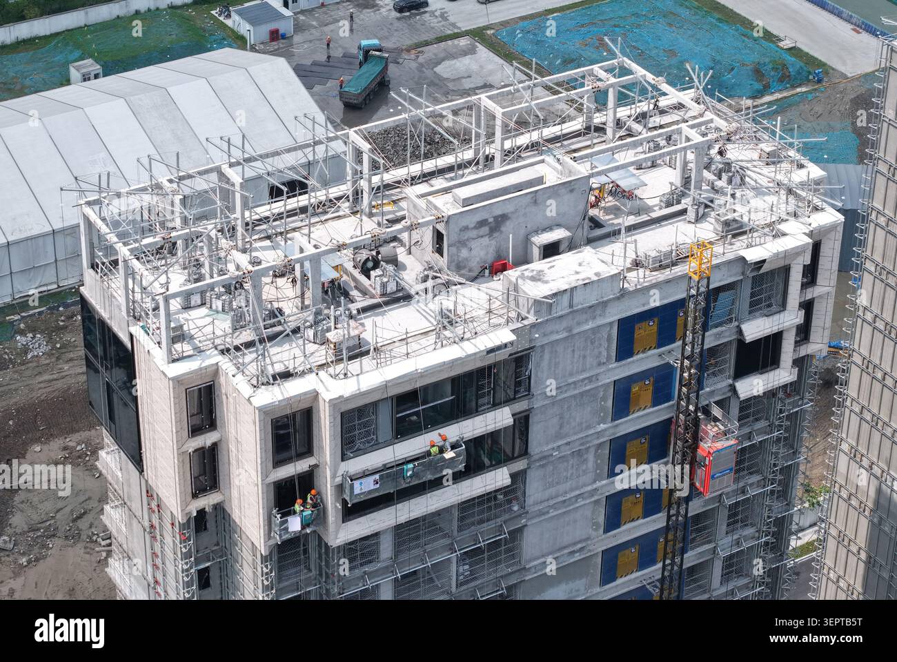 HANGZHOU, CHINA - JUNE 16, 2026 - A new residential complex under ...