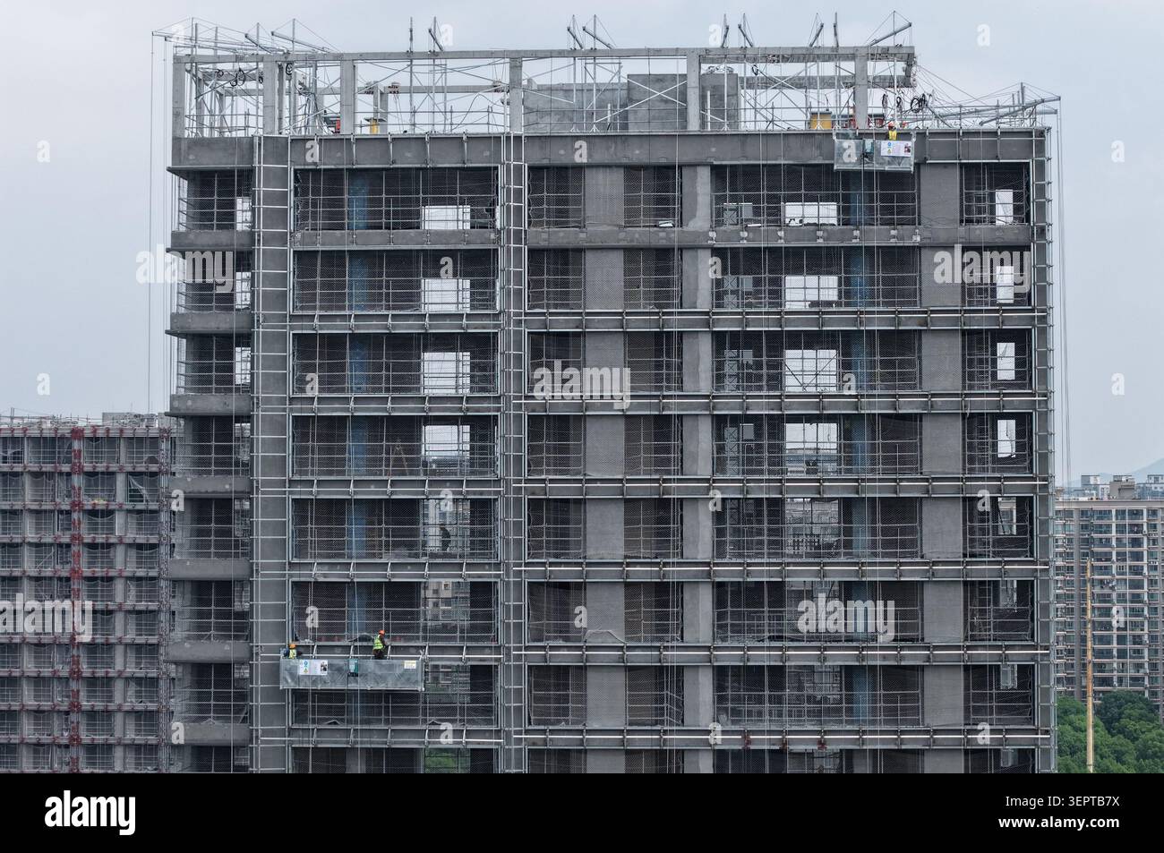 HANGZHOU, CHINA - JUNE 16, 2026 - A new residential complex under ...