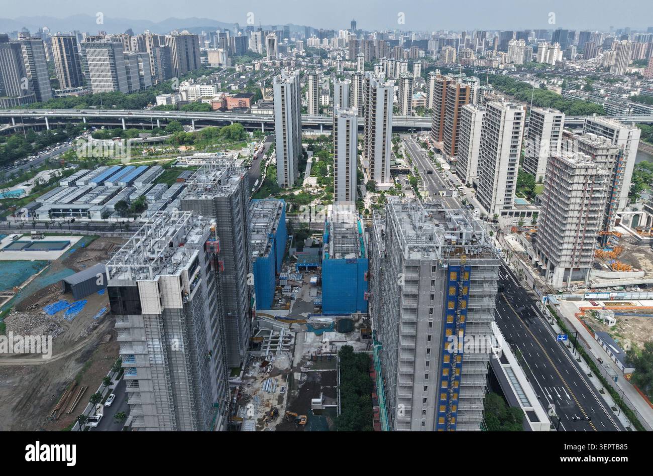 HANGZHOU, CHINA - JUNE 16, 2026 - A new residential complex under ...
