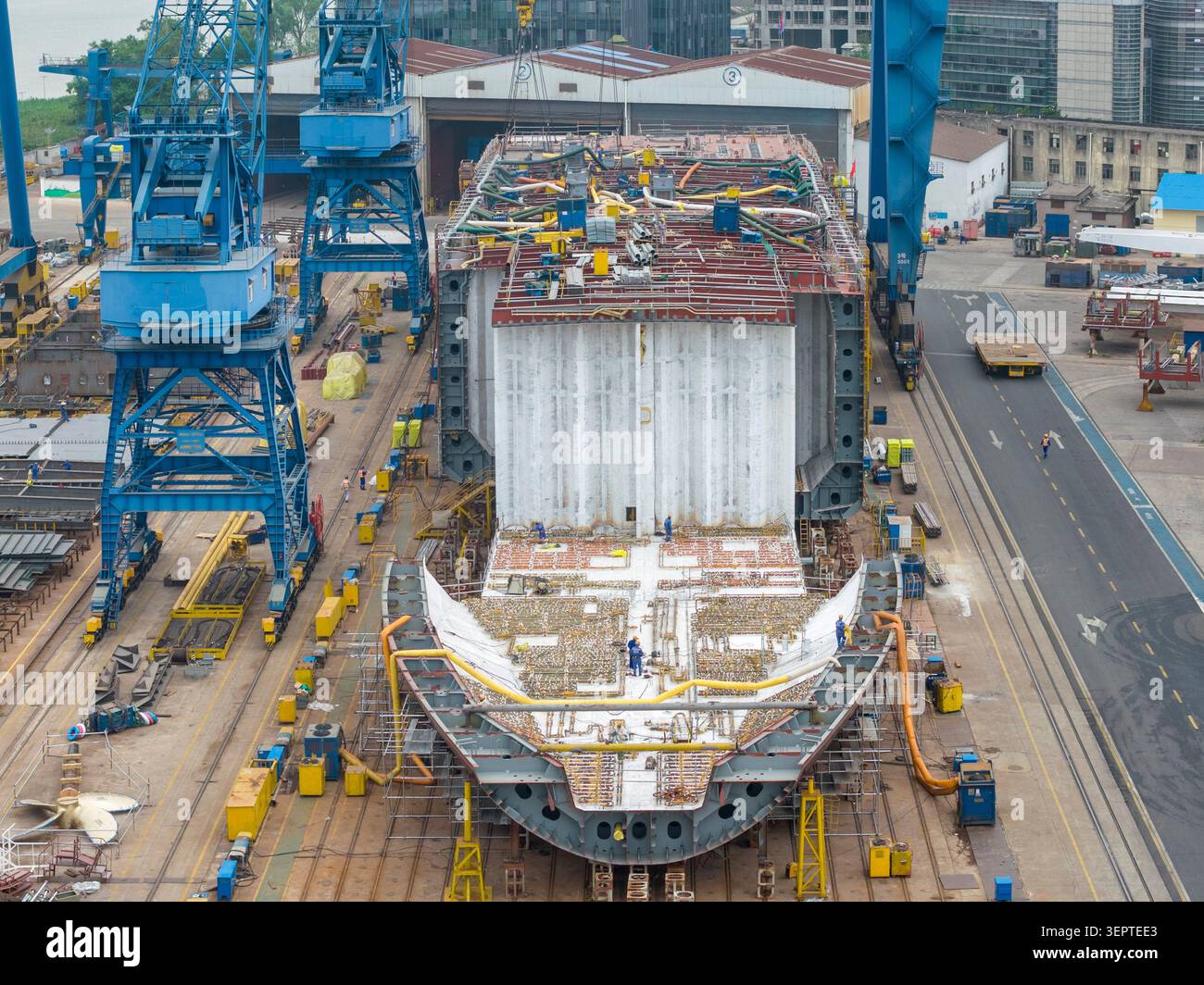 NANJING, CHINA - JUNE 16, 2026 - Workers are building large ships at ...