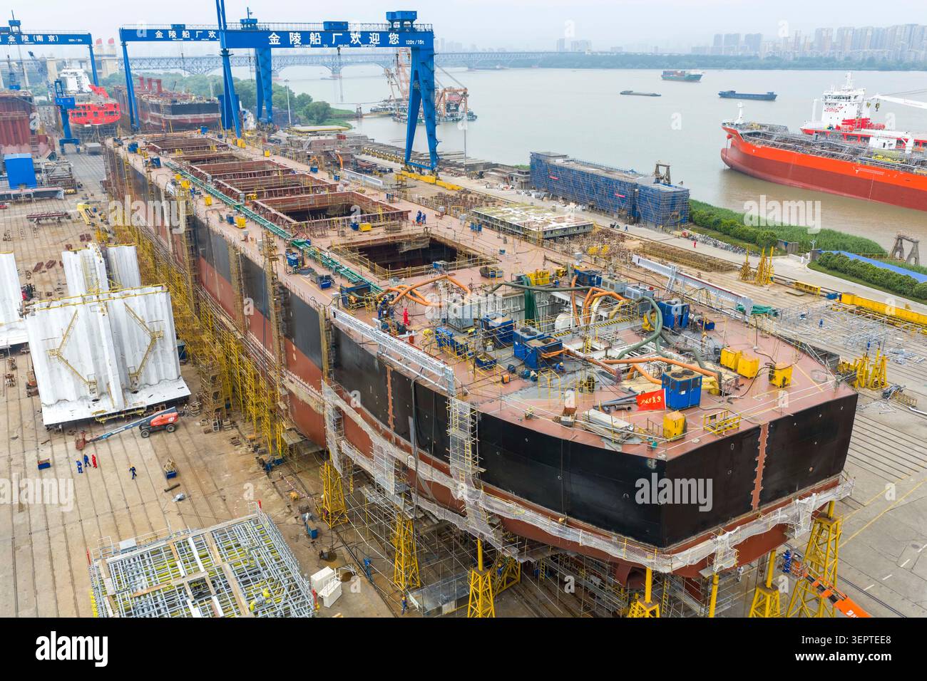 NANJING, CHINA - JUNE 16, 2026 - Workers are building large ships at ...