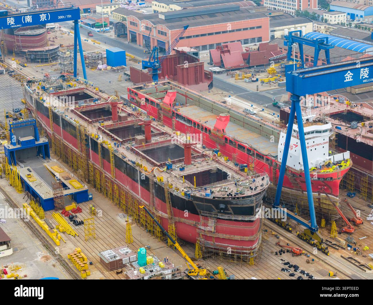NANJING, CHINA - JUNE 16, 2026 - Workers are building large ships at ...