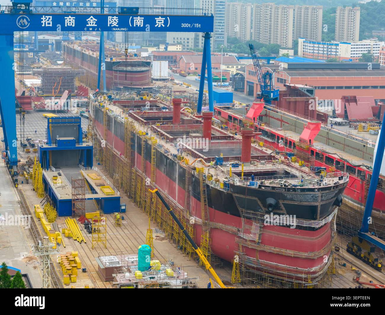 NANJING, CHINA - JUNE 16, 2026 - Workers are building large ships at ...