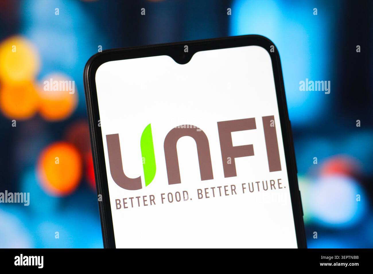 In this photo illustration, the UNFI (United Natural Foods) logo is ...