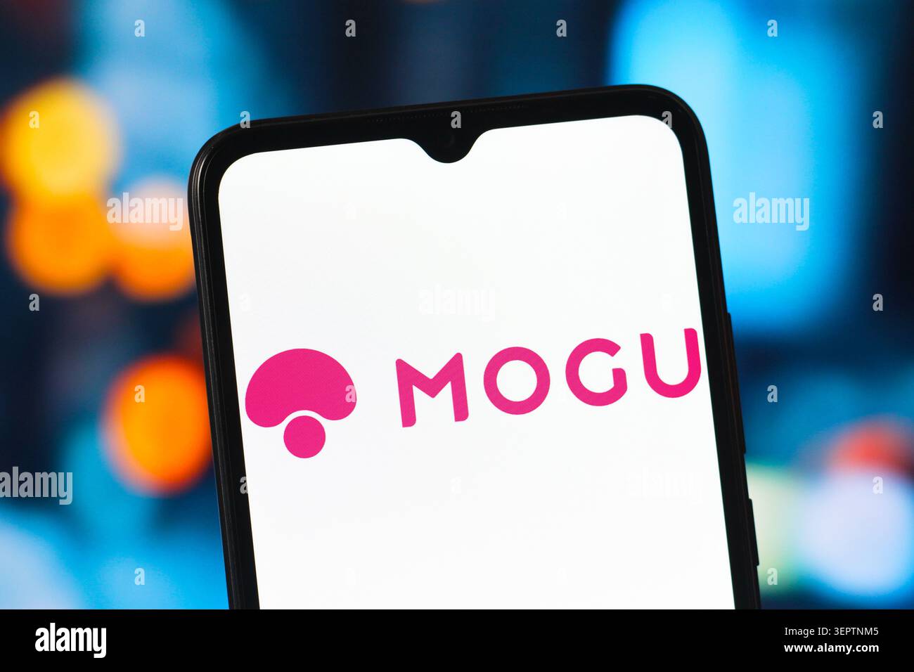 In this photo illustration, the MOGU logo is seen displayed on a ...