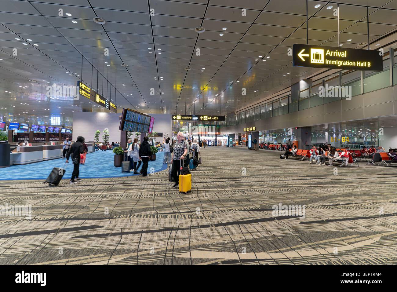 Singapore - December 9, 2025: Transfer B counters and flight ...
