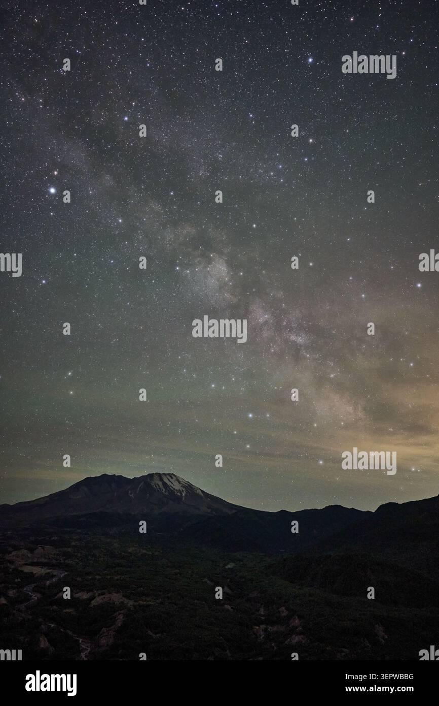 The Milky Way rises behind Mount St. Helens, Wash., during the new moon ...