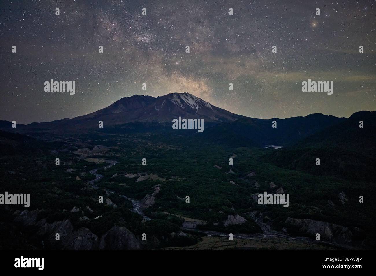 The Milky Way rises behind Mount St. Helens, Wash., during the new moon ...