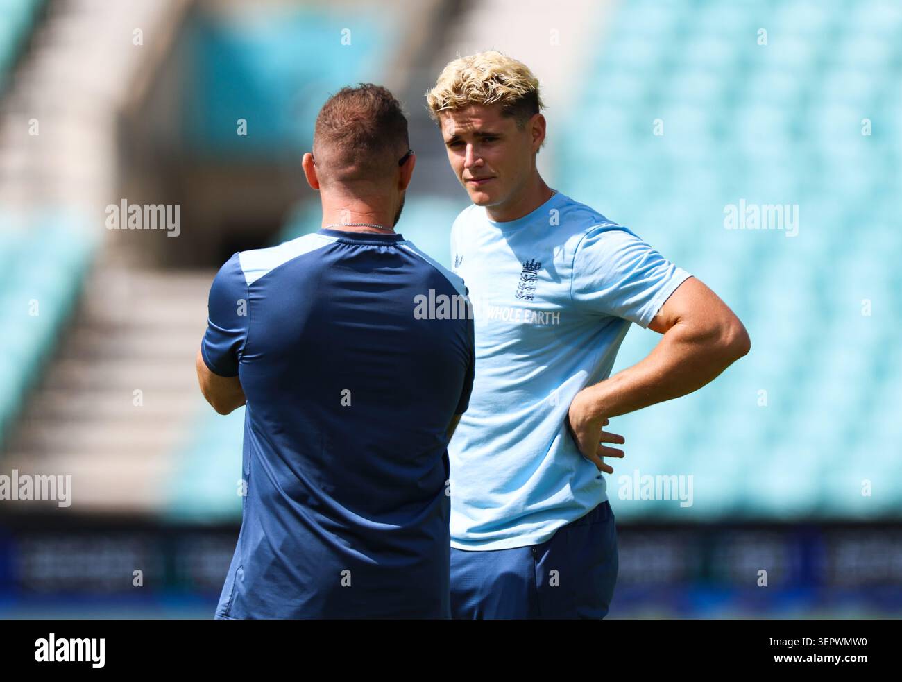 England's Jacob Bethell speaks to head coach Brendon McCullum during a ...