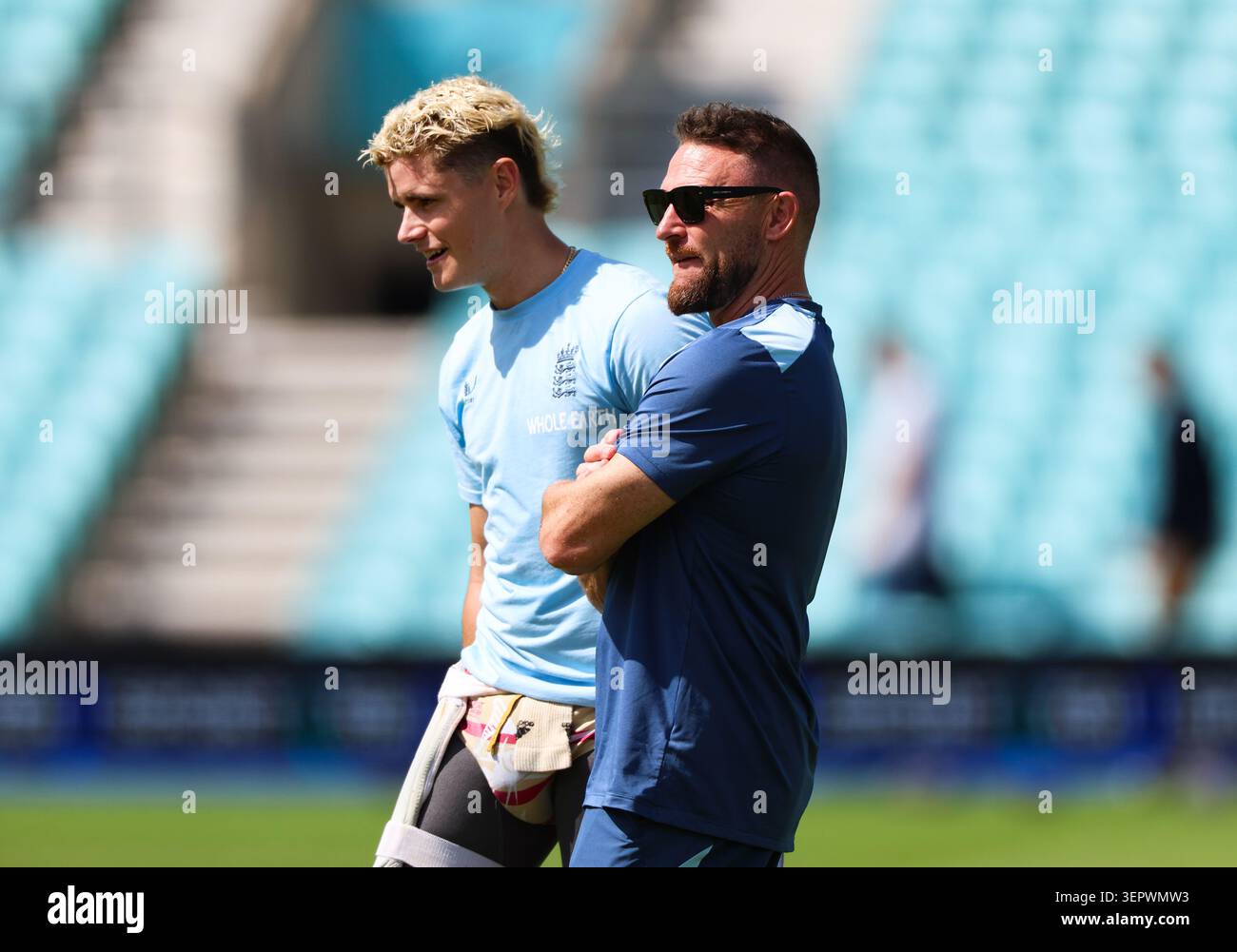 England's Jacob Bethell and head coach Brendon McCullum during a nets ...