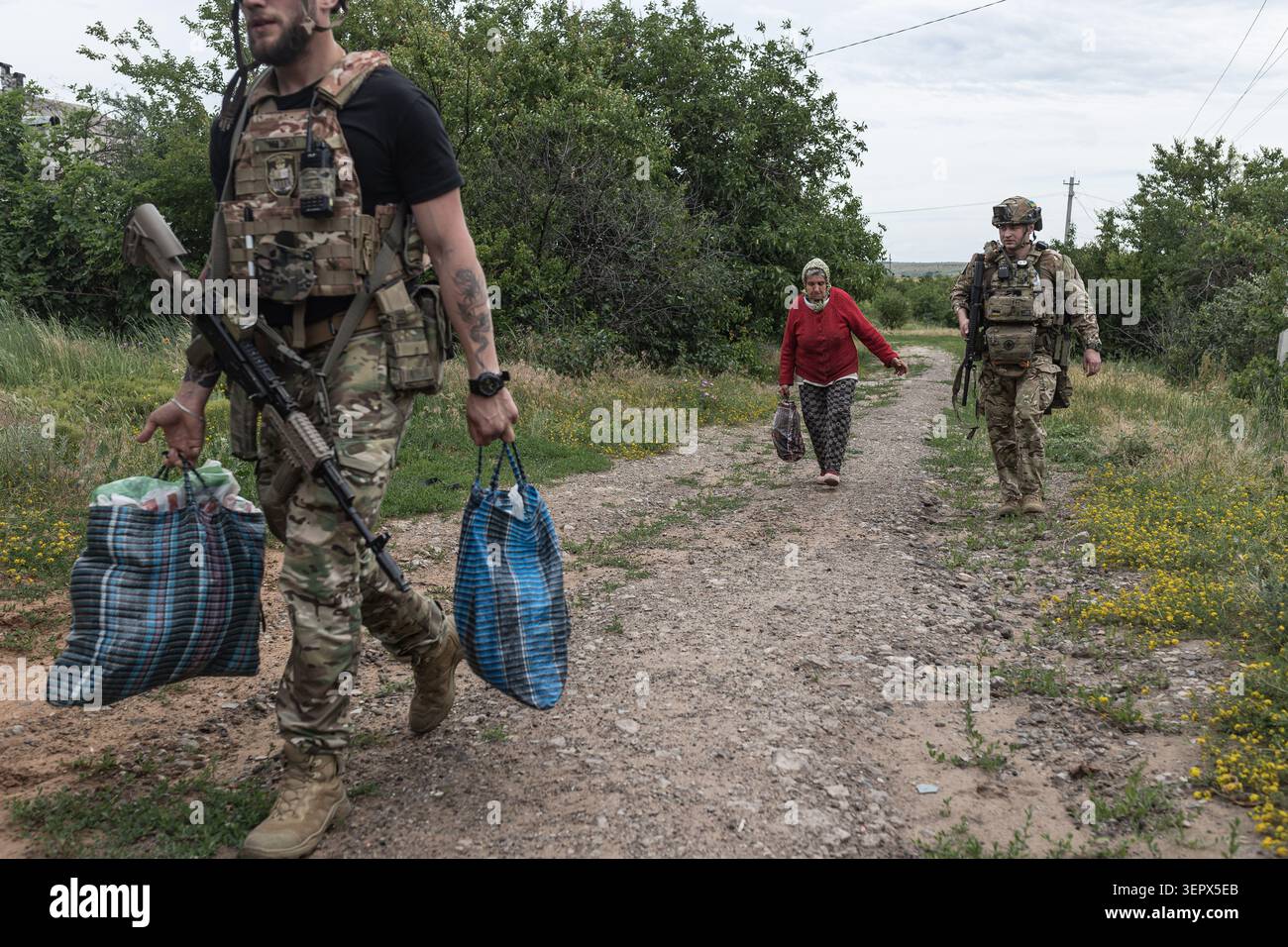 Druzhkivka, Ukraine. 15th June, 2026. A woman seen being evacuated by ...