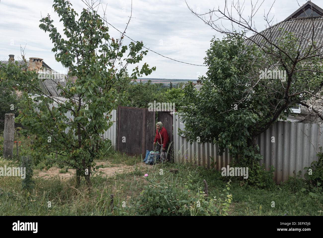 Druzhkivka, Ukraine. 15th June, 2026. A woman seen being evacuated by ...