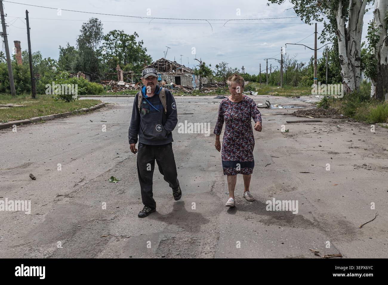Druzhkivka, Ukraine. 15th June, 2026. Civilians seen walking along a ...