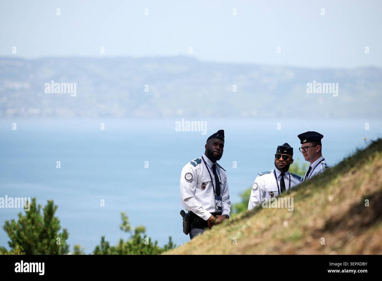 Security personnel stand guard at the G7 summit in Evian, France ...