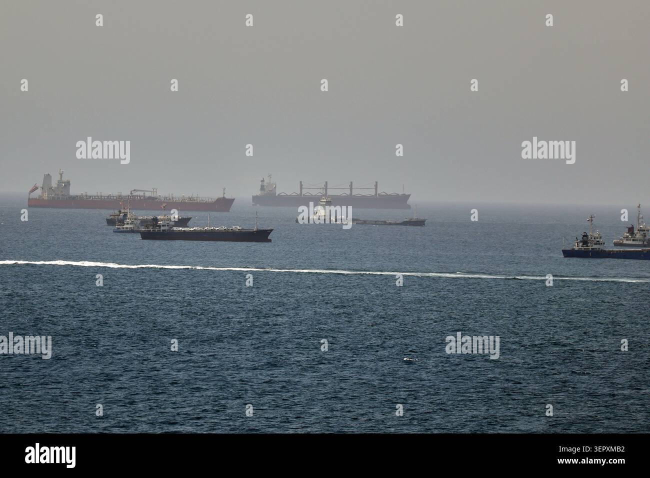 Tankers and cargo vessels are seen in the Gulf of Oman, along shipping ...