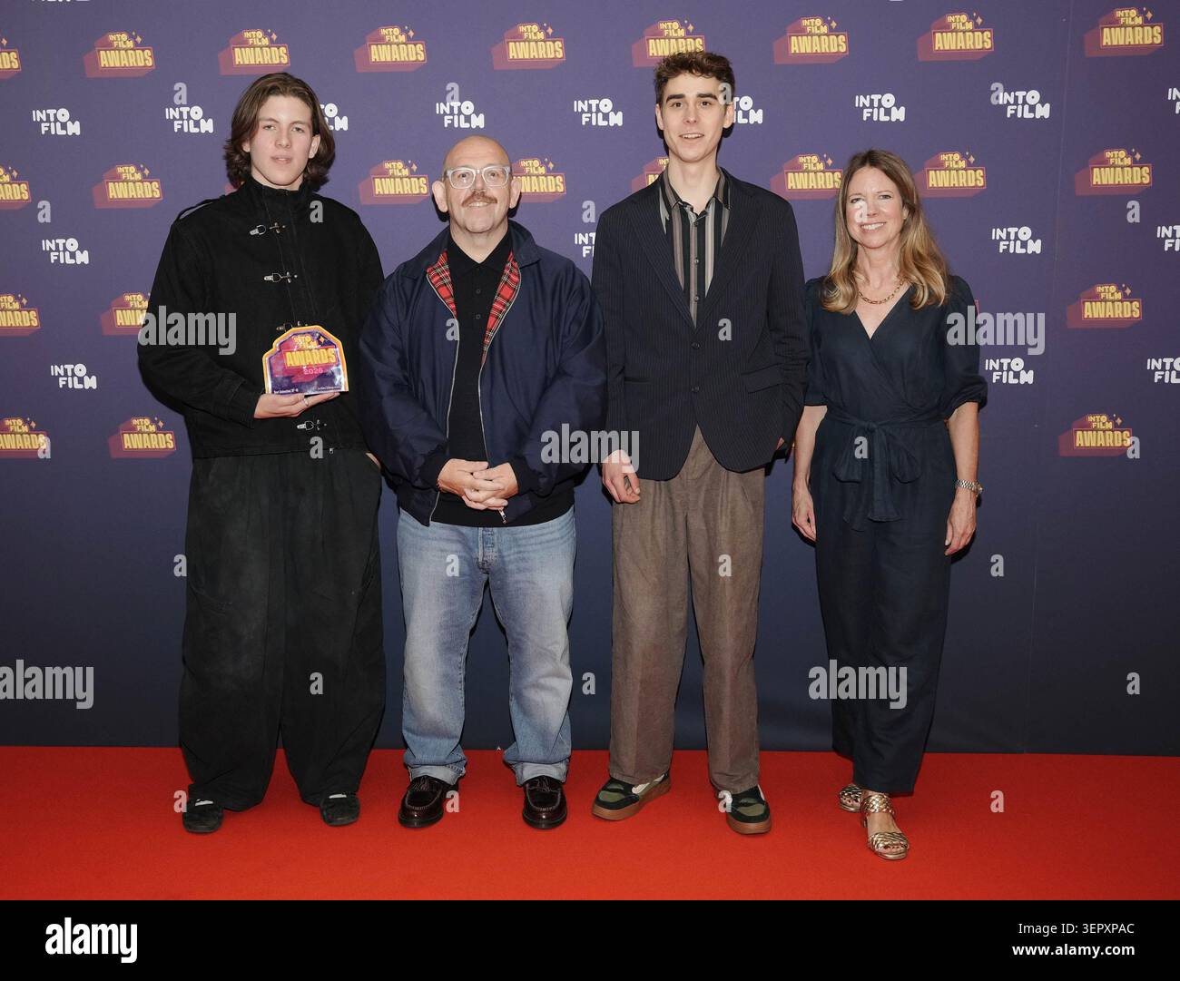 Nick Frost (2nd left ) and Charlotte Tudor (right) with the winners of ...