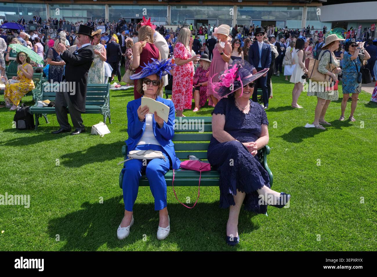 Racegoers take a break on the first day of the Royal Ascot horse race ...
