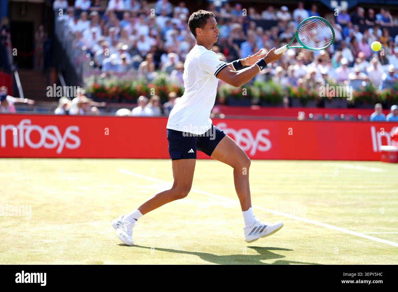 Canada's Gabriel Diallo in action against Australia's Alex de Minaur ...