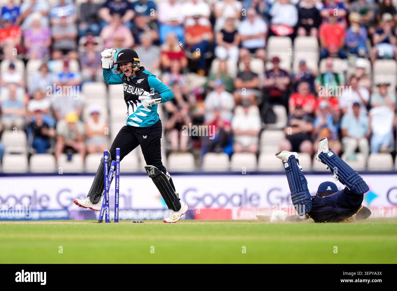 New Zealand's Izzy Gaze celebrates as Sri Lanka’s Hasini Perera is run ...