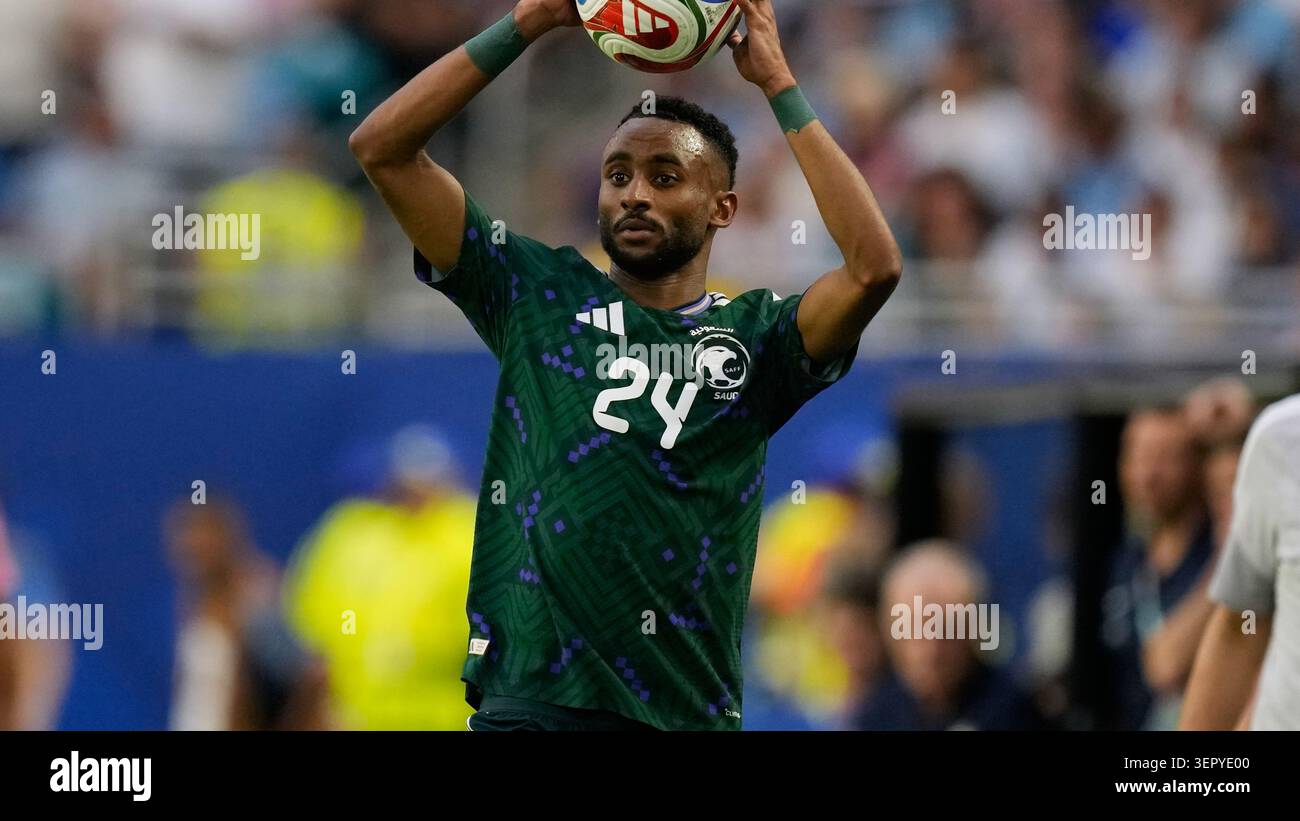 Saudi Arabia's Moteb Alharbi (24) prepares to throw the ball in during ...