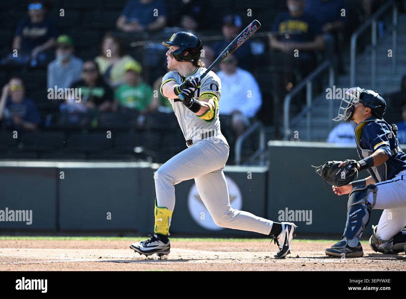 Jax Gimenez (7) of the Oregon Ducks follows through on a swing during a ...