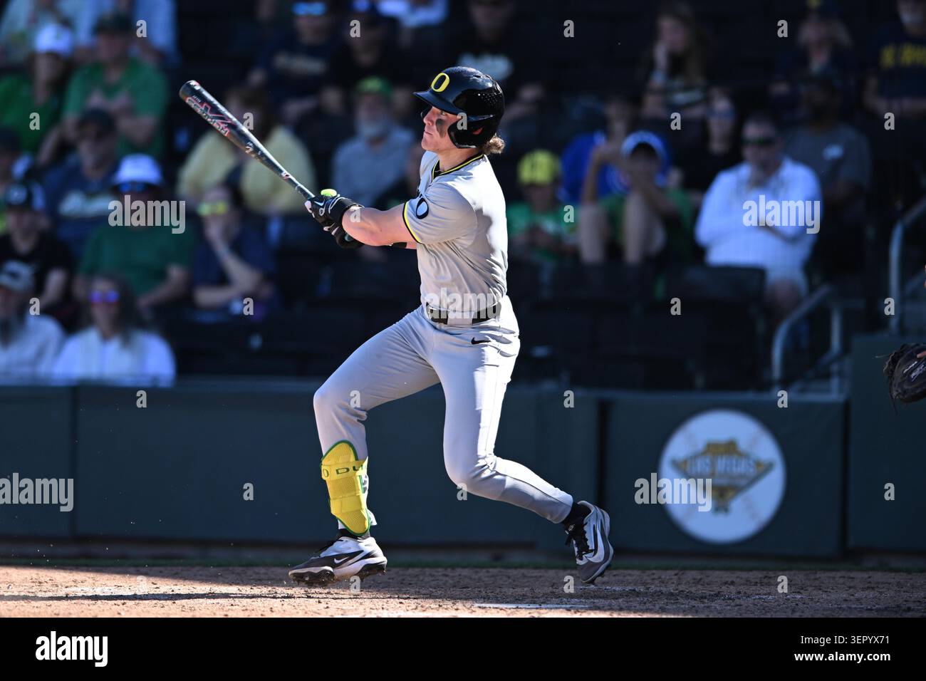 Jax Gimenez (7) of the Oregon Ducks follows through on a swing during a ...