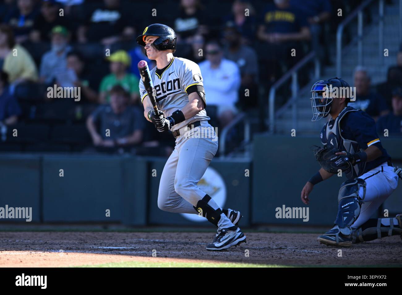 Maddox Molony (9) of the Oregon Ducks follows through on a swing during ...