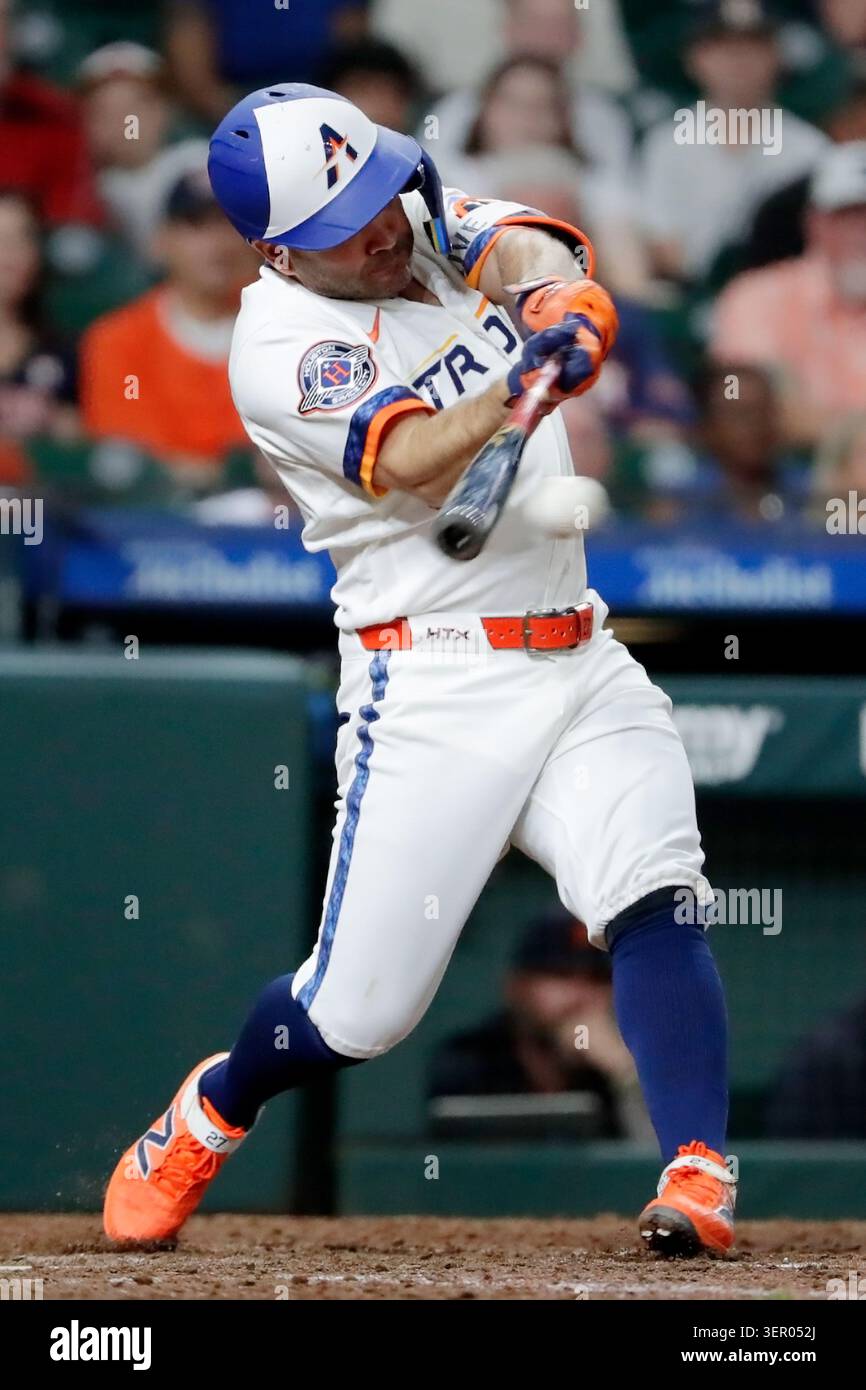 Houston Astros' Jose Altuve connects against the Detroit Tigers during ...