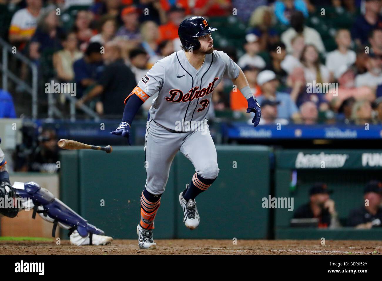 Detroit Tigers' Zach McKinstry drops his bat as he rounds the bases on ...