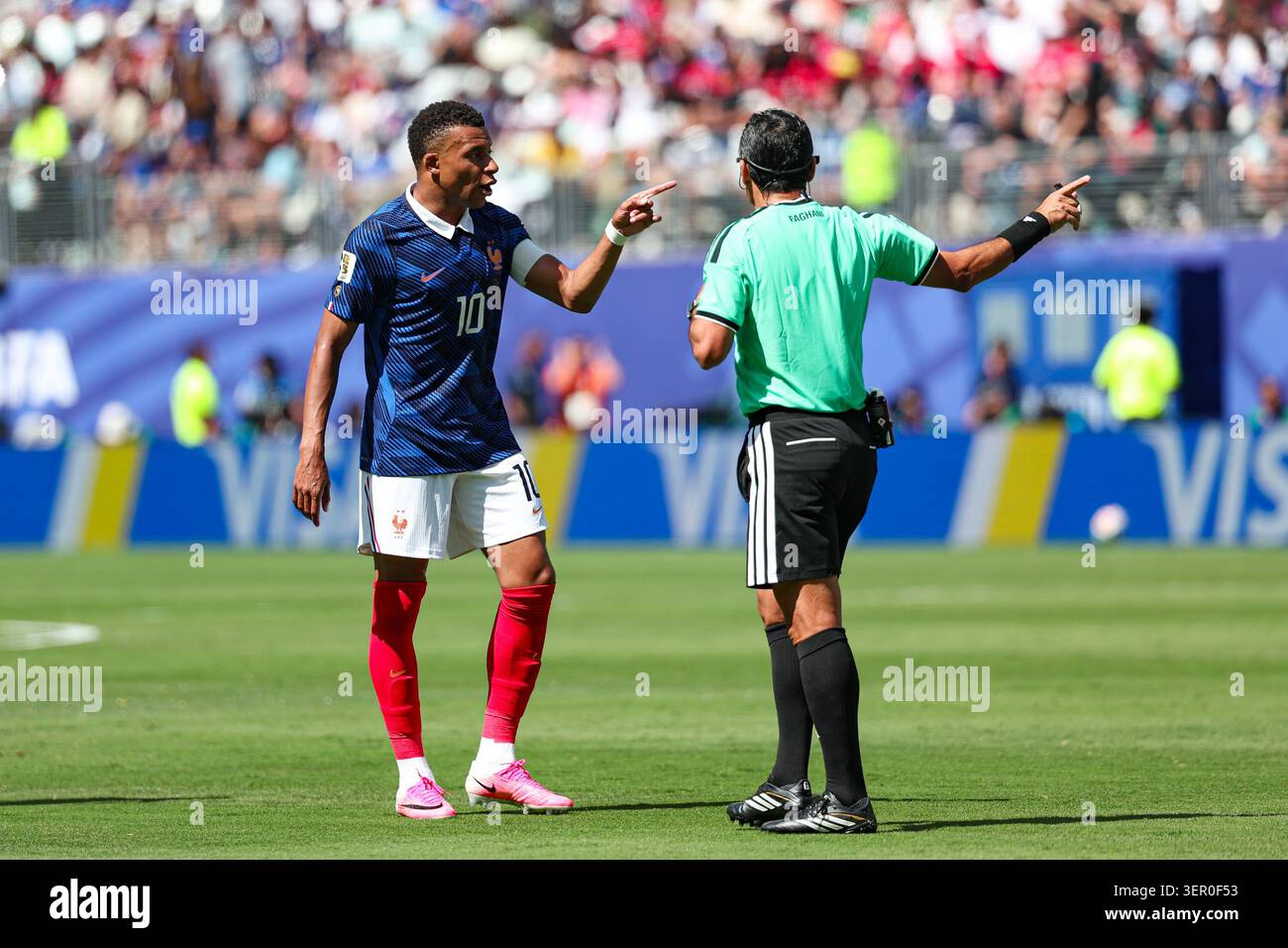 Kylian MBAPPE of France and Referee Alireza Faghani during the FIFA ...
