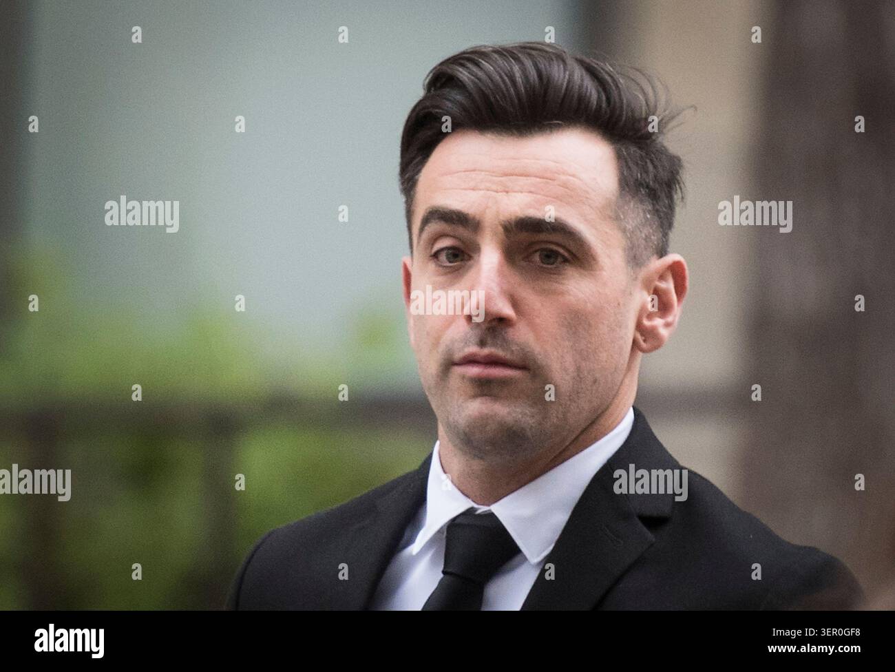 Canadian musician Jacob Hoggard arrives at the Toronto courthouse on ...