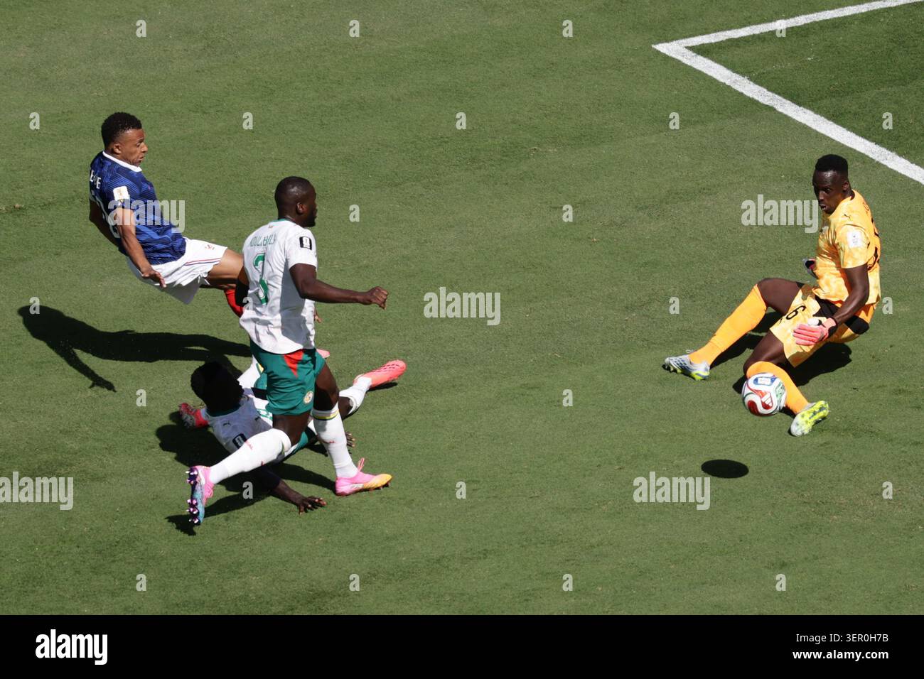 Senegal goalkeeper Edouard Mendy saves a shot by France's Kylian Mbappe ...